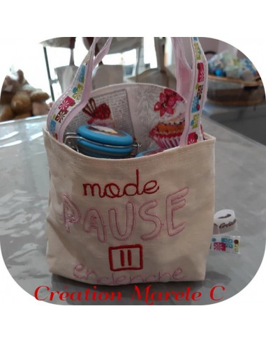 embroidery design machine pause mode engaged